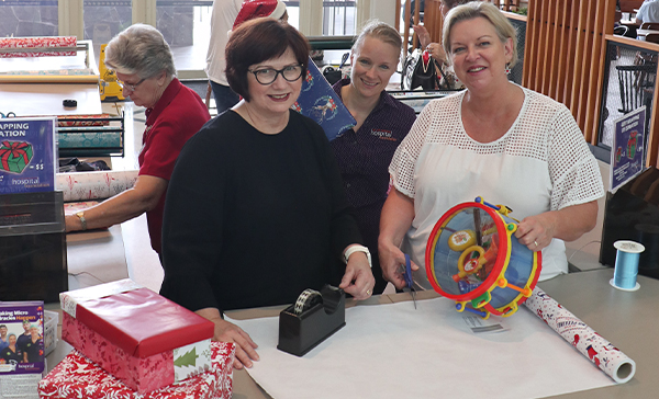 Busy elves wrap wrap wrapping | Far North Queensland Hospital Foundation